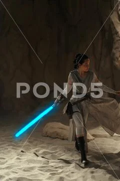 Cosplayer girl portrays character Rey Skywalker from the Star Wars ...