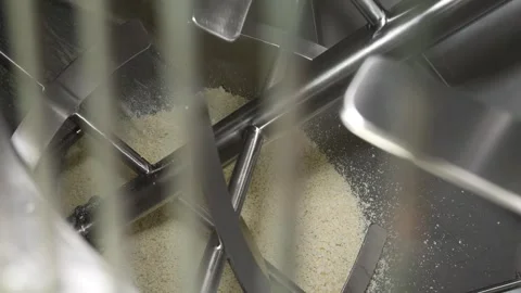 Cottage cheese grains fall into containe... | Stock Video | Pond5