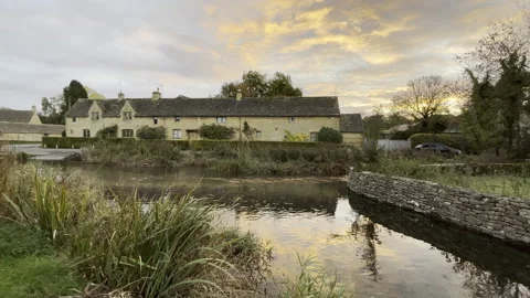 Cottages on a sunset - Cotswolds England | Stock Video | Pond5