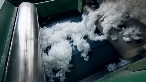 Cotton wool is moving between two convey... | Stock Video | Pond5