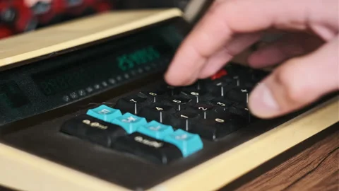 Counting on an Old Vintage Calculator | Stock Video | Pond5