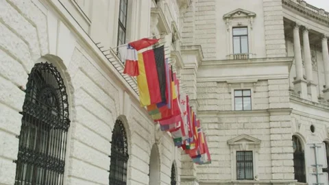 Country flags on display on the side bui... | Stock Video | Pond5