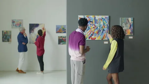Couple Discussing Painting in Art Galler... | Stock Video | Pond5
