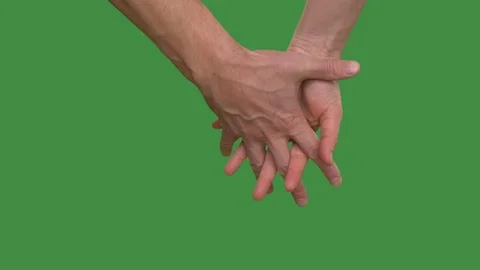 Couple holding hands in lock, cropped vi... | Stock Video | Pond5