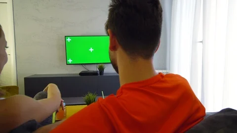 Couple in living room with green screen ... | Stock Video | Pond5