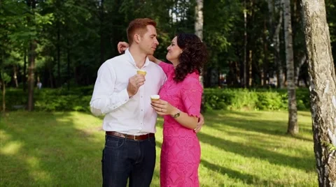 Couple in Love Eating Ice Cream and Kiss... | Stock Video | Pond5