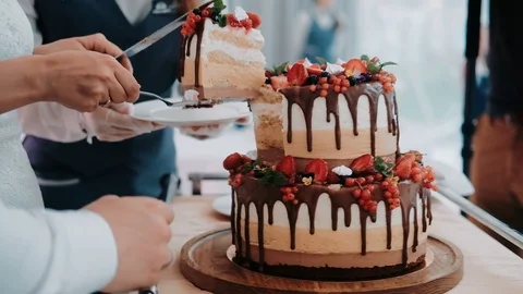 Couple in love together cuts a wedding c... | Stock Video | Pond5