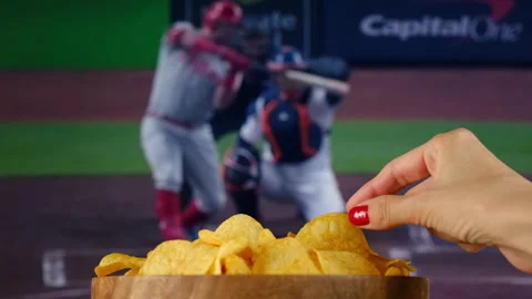 Couple watching baseball game on tv and ... | Stock Video | Pond5