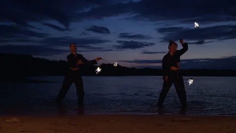 Courage Women Dancing With Fire On River... | Stock Video | Pond5