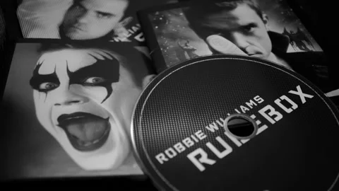 Covers of the cd by British singer ROBBI... | Stock Video | Pond5