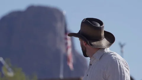 Cowboy man looking at camera rack focus ... | Stock Video | Pond5