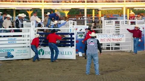 Cowboy riding a crazy horse in a rodeo | Stock Video | Pond5