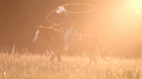 Cowboy Riding Into Sunset Stock Footage ~ Royalty Free Stock Videos | Pond5