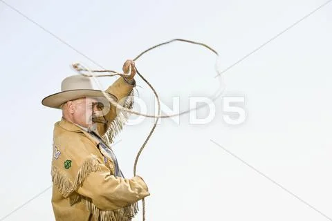 Stock Photograph: A cowboy throwing a lassoo #25158667