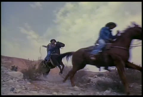 Cowboys ride their horses fast across th... | Stock Video | Pond5