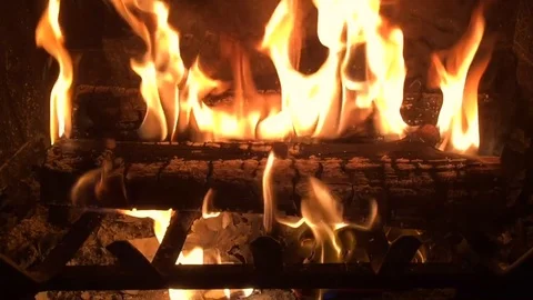 A cozy log fire on a cold night! | Stock Video | Pond5