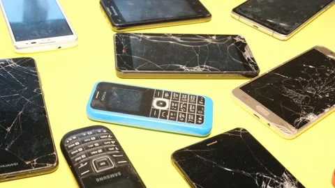 Cracked mobile phones with a cracked scr... | Stock Video | Pond5