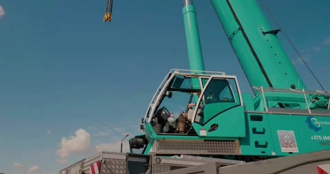 Crane operator controls the crane. Rotat... | Stock Video | Pond5