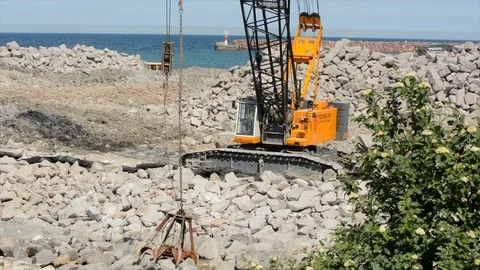 Crane Picking Stone With massive Claw On... | Stock Video | Pond5