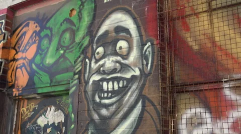 Crazy and goofy looking bald guy. Graffi... | Stock Video | Pond5