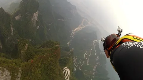Crazy BASE jump wingsuit proximity flyin... | Stock Video | Pond5