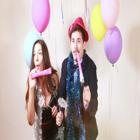 Crazy couple dancing and blowing party h... | Stock Video | Pond5
