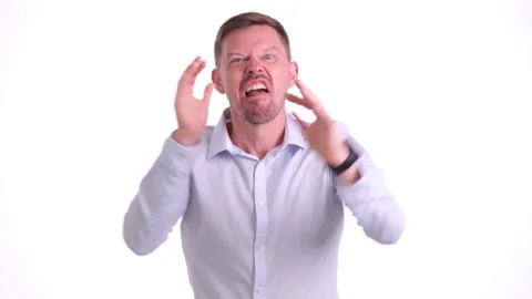 Crazy man in playful mood makes funny fa... | Stock Video | Pond5