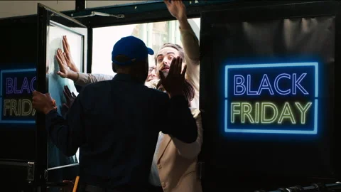 Crazy obsessed shoppers push front door | Stock Video | Pond5