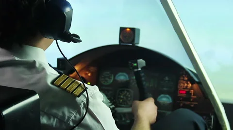 Crazy pilot drinking alcohol in cockpit ... | Stock Video | Pond5