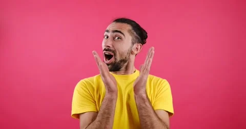 Crazy young man clapping hands | Stock Video | Pond5