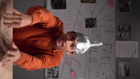 Crazy young man in tinfoil hat with tota... | Stock Video | Pond5