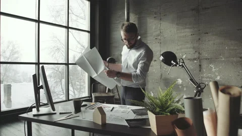 Creative architect thinking on big drawi... | Stock Video | Pond5