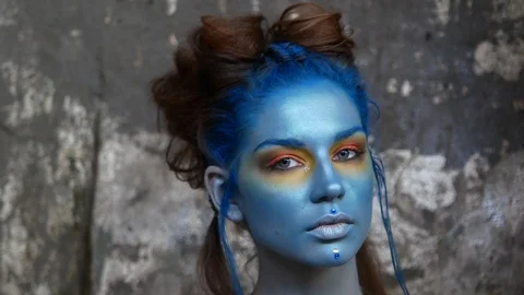 Creative make-up of blue color. Model bo... | Stock Video | Pond5