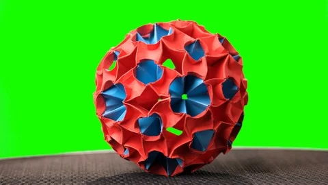 Creative origami ball on green screen. | Stock Video | Pond5