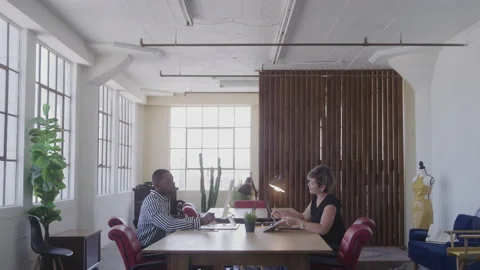 Creative Team Discussing Their Work at a... | Stock Video | Pond5