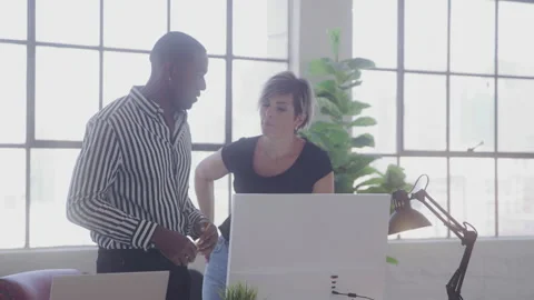 Creative Team Working in a Bright Office... | Stock Video | Pond5
