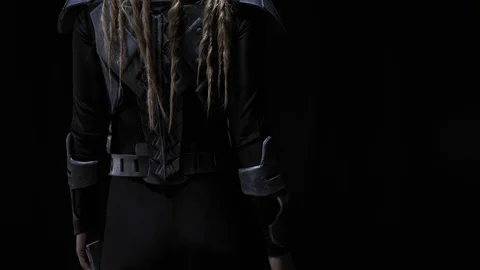 Creepy alien with dreadlocks and armor i... | Stock Video | Pond5