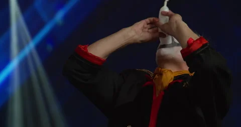 Creepy clown mime showing magic tricks o... | Stock Video | Pond5