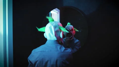 Creepy looking man with horror clown mas... | Stock Video | Pond5