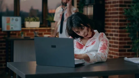Creepy looking office zombie woman worki... | Stock Video | Pond5