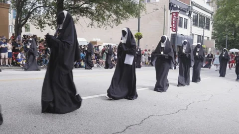 Creepy nuns with blacked out faces walk ... | Stock Video | Pond5