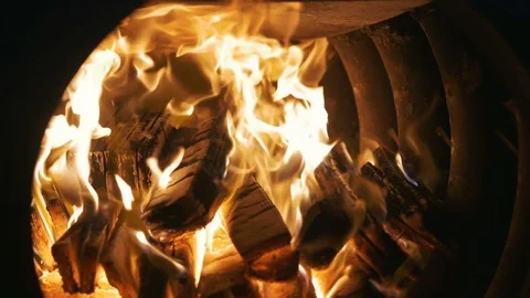 crest of flame on burning wood in firepl... | Stock Video | Pond5