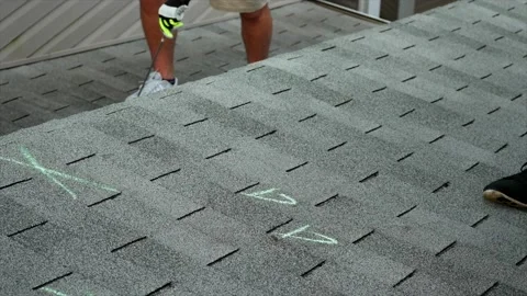 Crew Chalking roof hail and wind damage ... | Stock Video | Pond5
