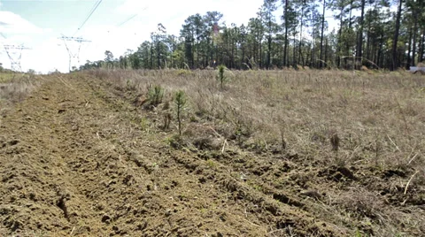 A crew member grading a fire break with ... | Stock Video | Pond5