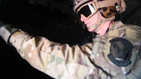 Crew prepare to unload military vehicle ... | Stock Video | Pond5