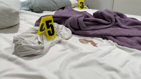 Crime scene with blood stain on sheets | Stock Video | Pond5