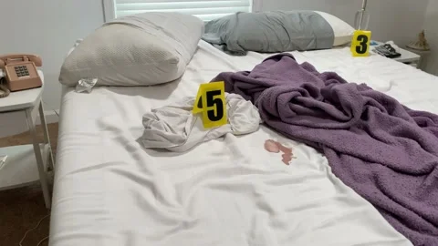 Crime scene with blood stain on sheets | Stock Video | Pond5
