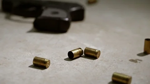 Crime Scene Bullet Casings and Handgun. | Stock Video | Pond5