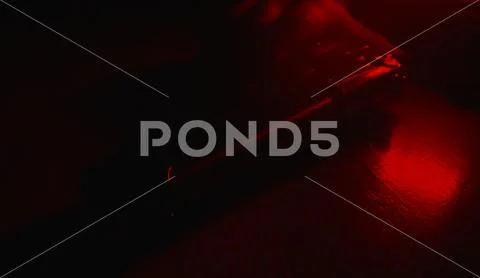 Crime scene in police lights. Hand of victim and pistol. ~ Premium ...