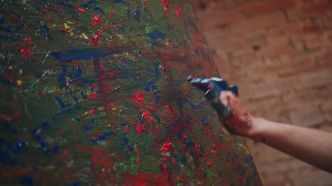 Crop painter drawing symbols with oil pa... | Stock Video | Pond5